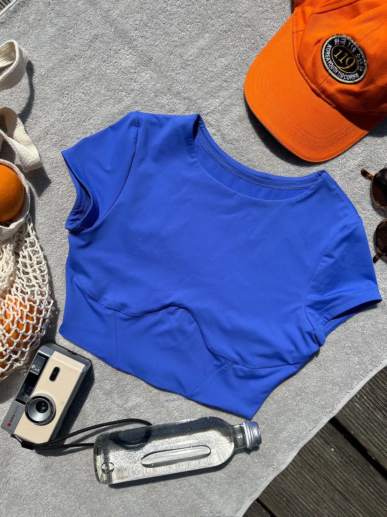 [ SWIM ] Panelled Short Sleeve Swim Crop Top in Indigo Illusion ...